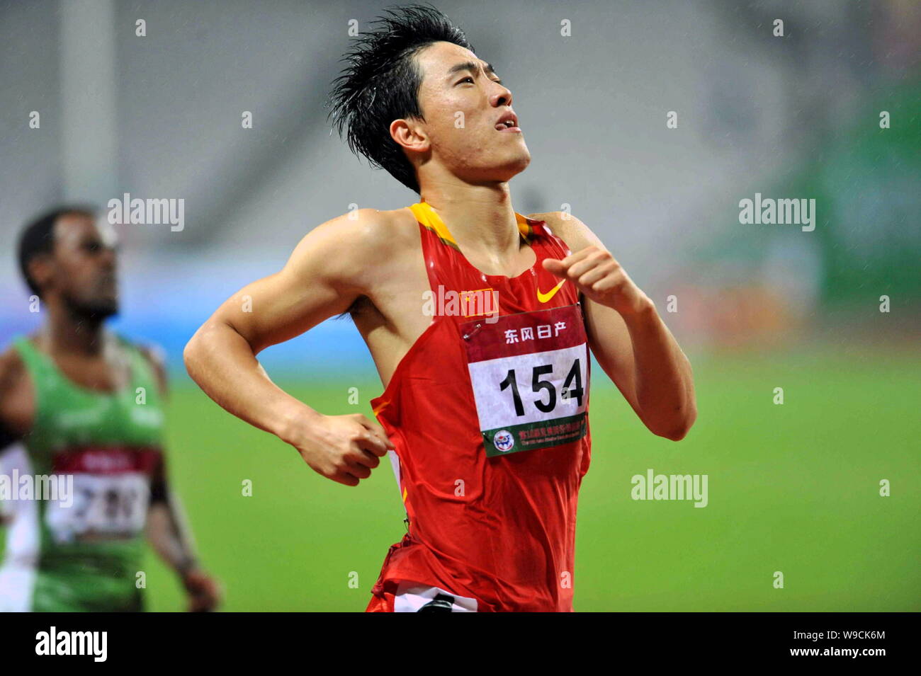 Chinese hurdler Liu Xiang competes in the final of the mens 110m ...