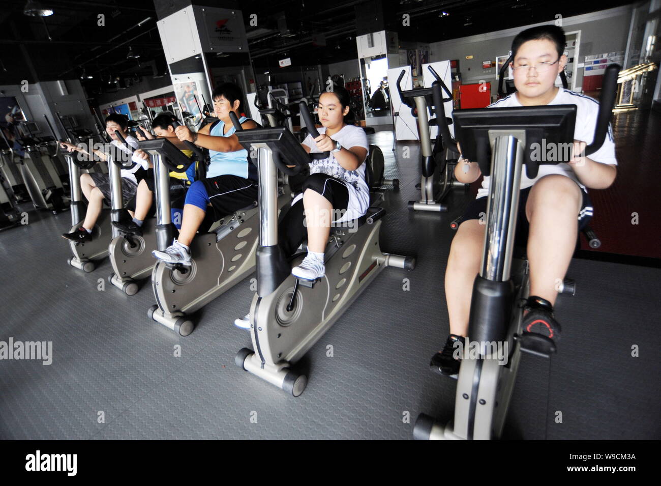 Obese cycling hi-res stock photography and images - Alamy