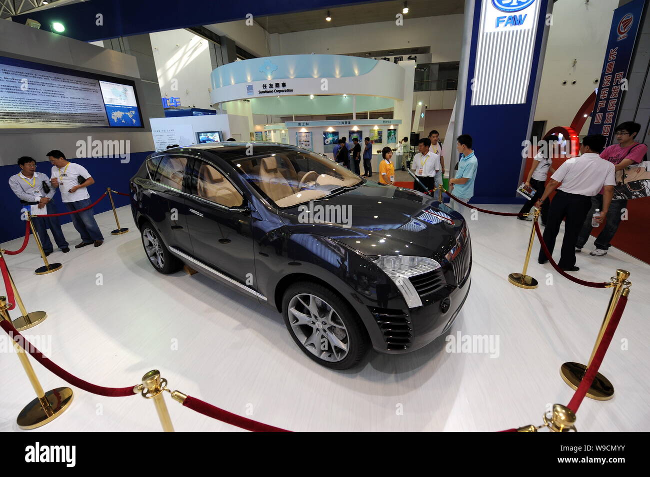 --FILE--Chinese visitors look at a Hongqi (Red Flag) concept SUV of FAW ...