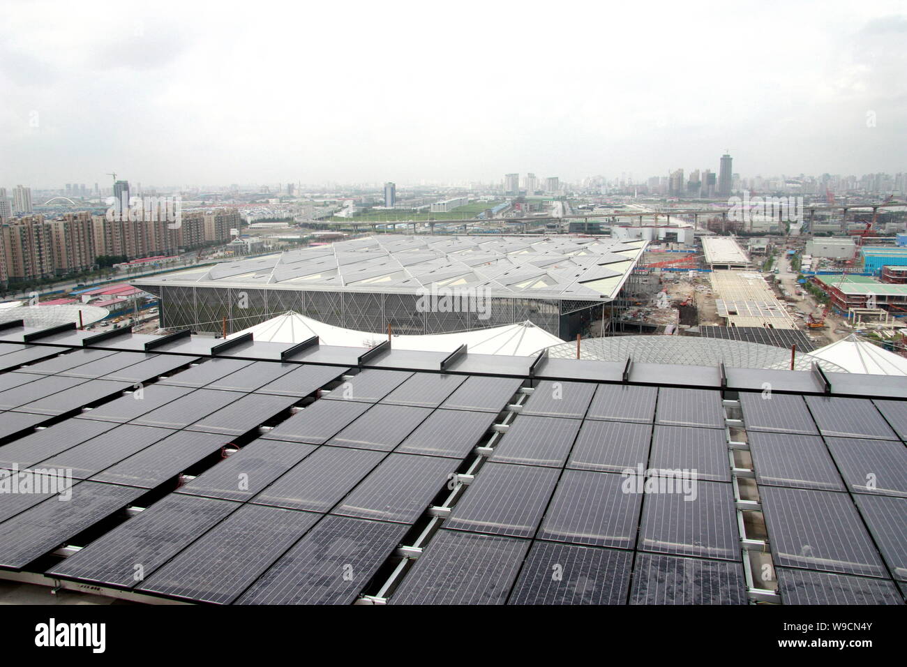 Solar panels are seen installed on the rooftops of the China Pavilion ...