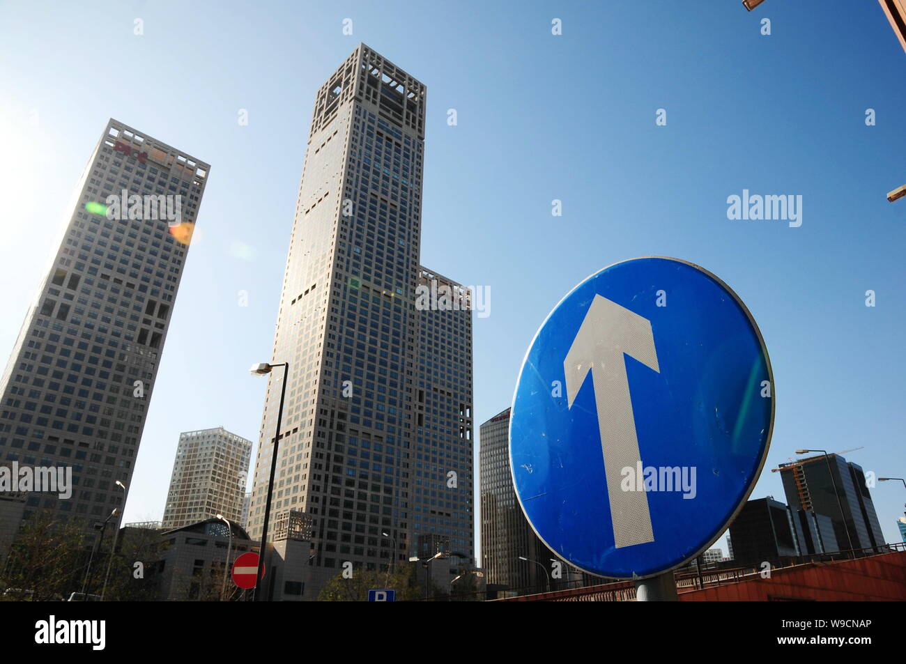--FILE--A rising sign is seen in front of the skyscrapers of Yintai ...