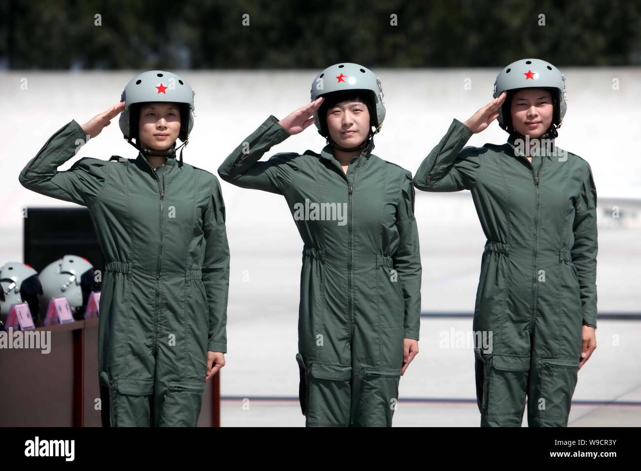 Young Female Fighter Plane Pilots Of Chinese Pla Air Force Salute