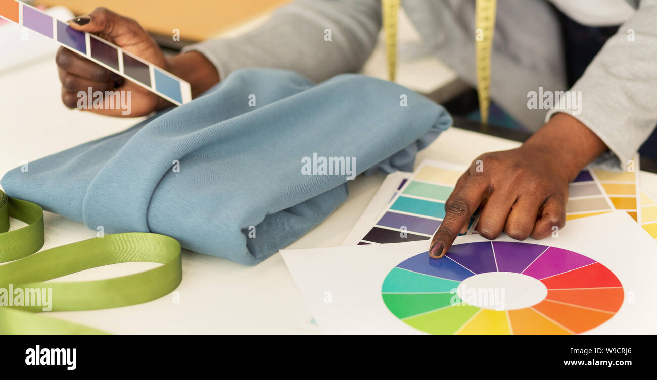 Female Designer Working With Fabric And Color Samples, Closeup Stock ...