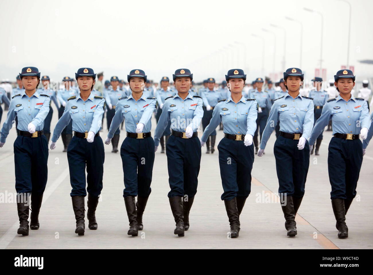Female Chinese PLA soldiers exercise during a military parade training ...