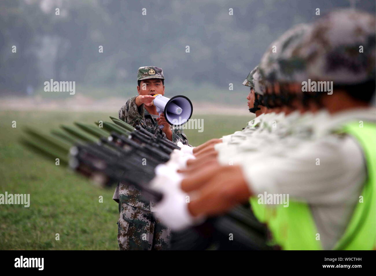 Chinese militia soldiers exercise during a military parade training ...