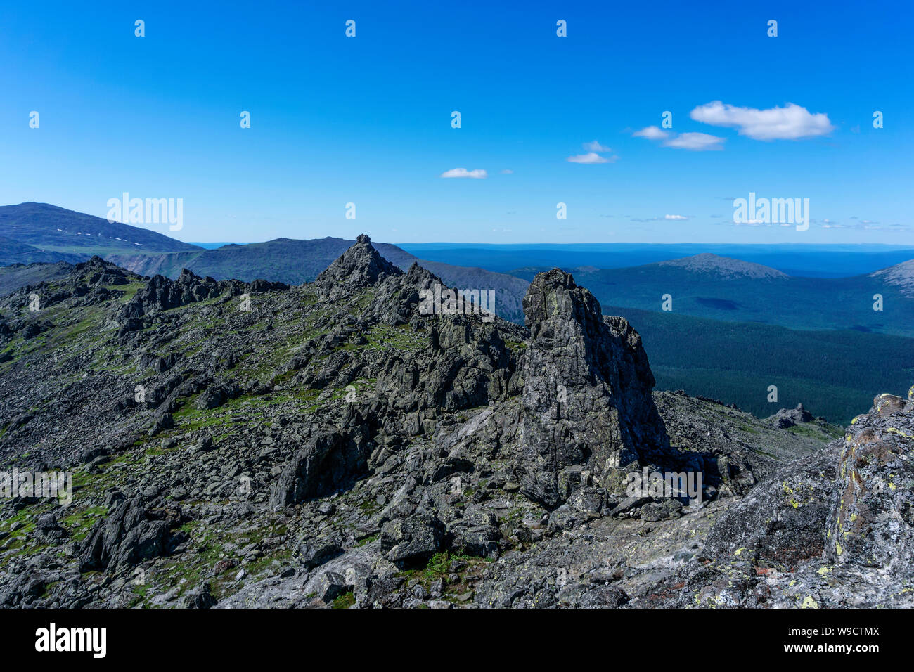 beautiful mountain landscape with spectacular black rocks in a blue ...