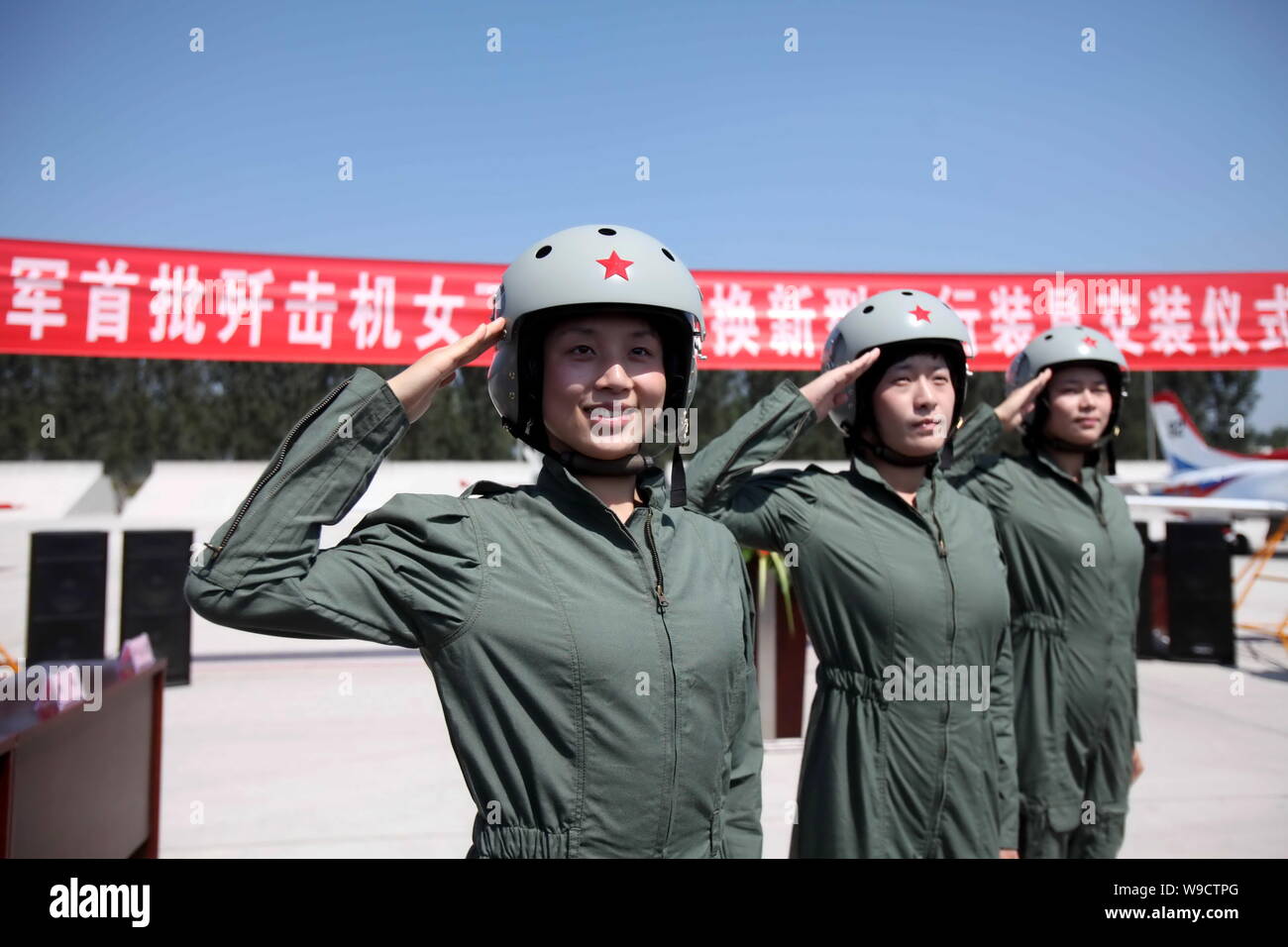 Young Female Fighter Plane Pilots Of Chinese Pla Air Force Salute