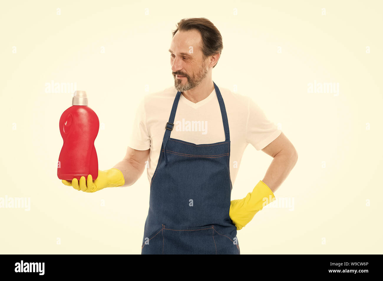 Cleaning service and household duty. Man in rubber gloves hold plastic ...