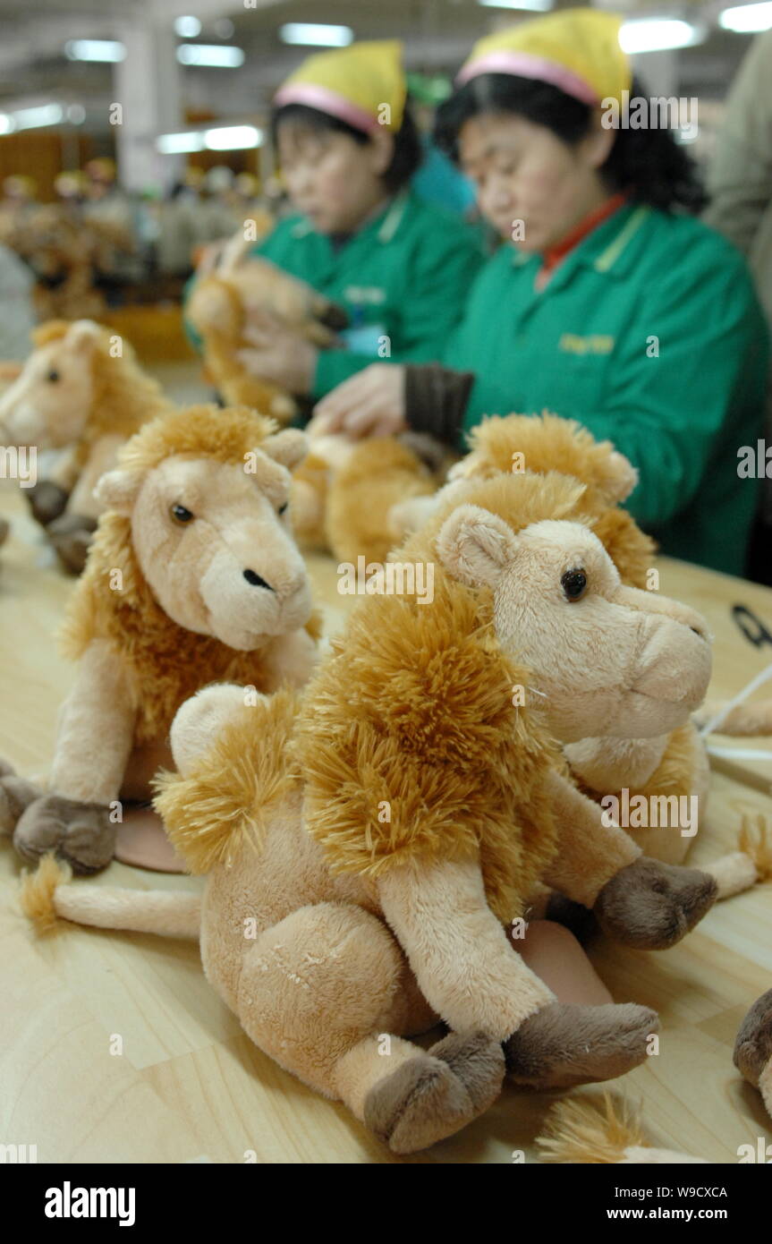 Toy factory workers hi-res stock photography and images - Alamy