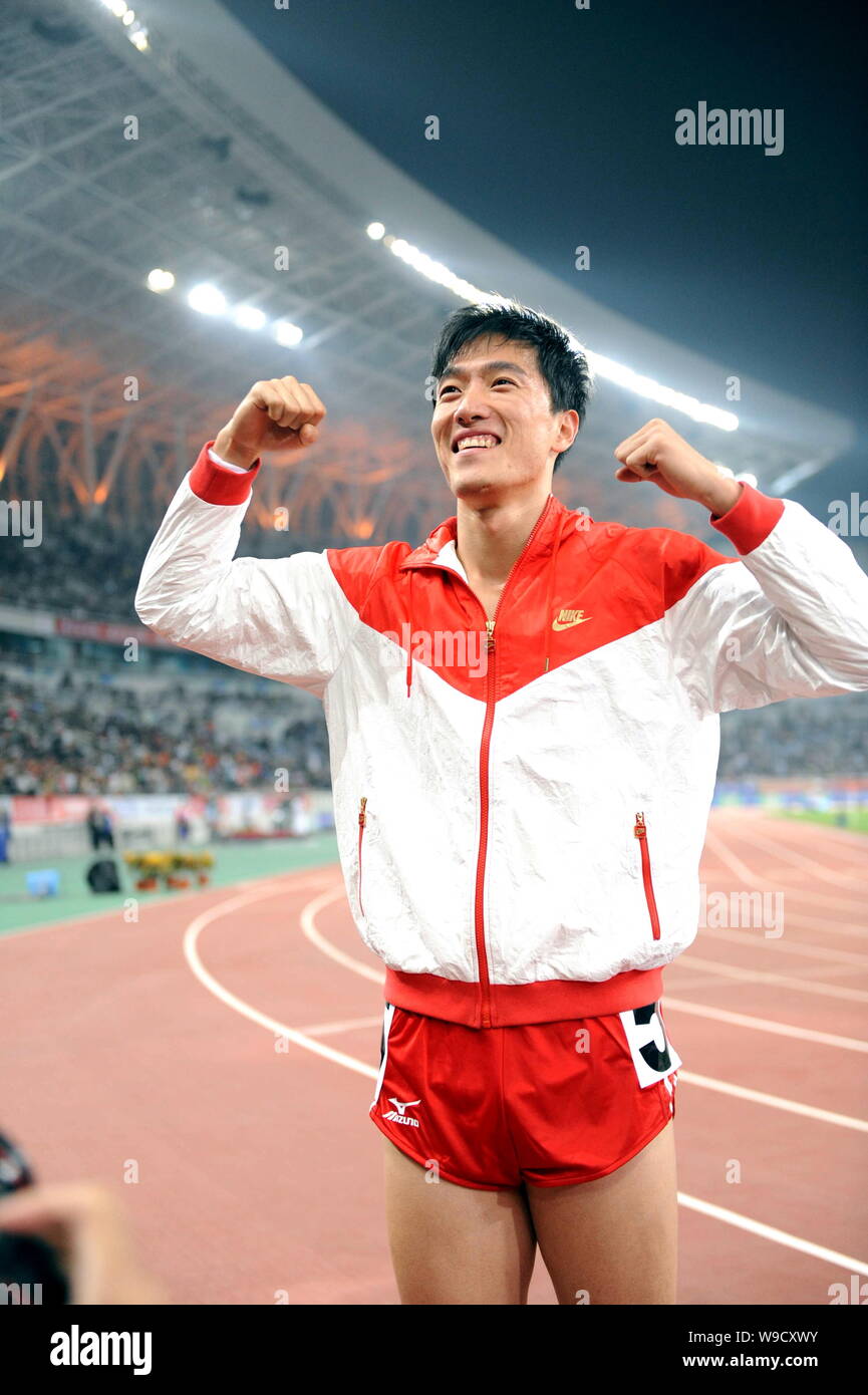 Chinas liu xiang celebrates after hi-res stock photography and images ...