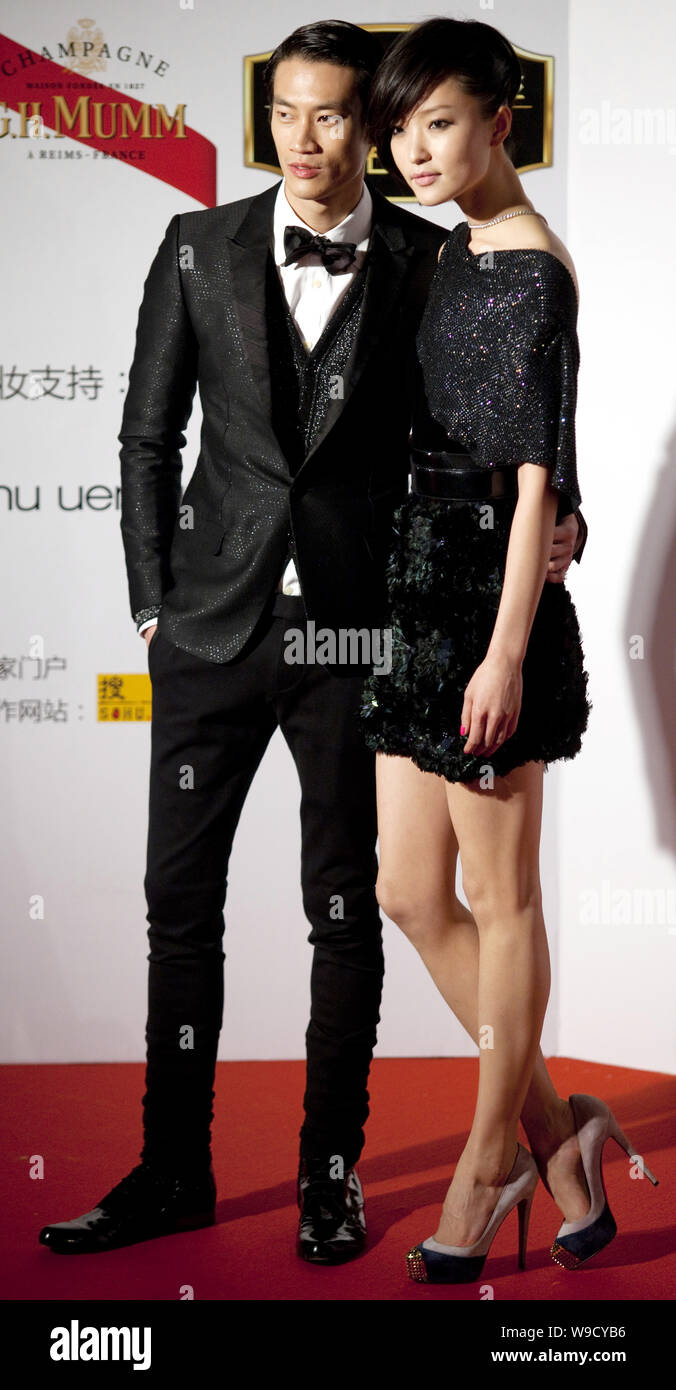 Chinese models Du Juan, right, and Philip Huang are seen at the red ...