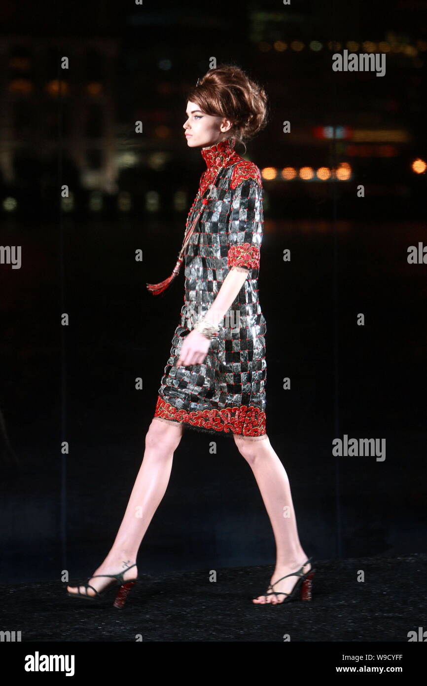 A model parades to display the new collection by fashion designer Karl ...