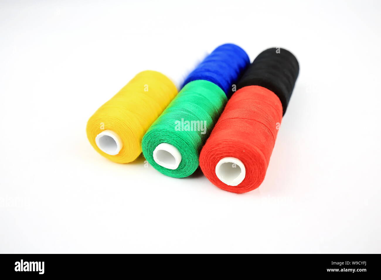 Yarn in different colors isolated against white background Stock Photo ...