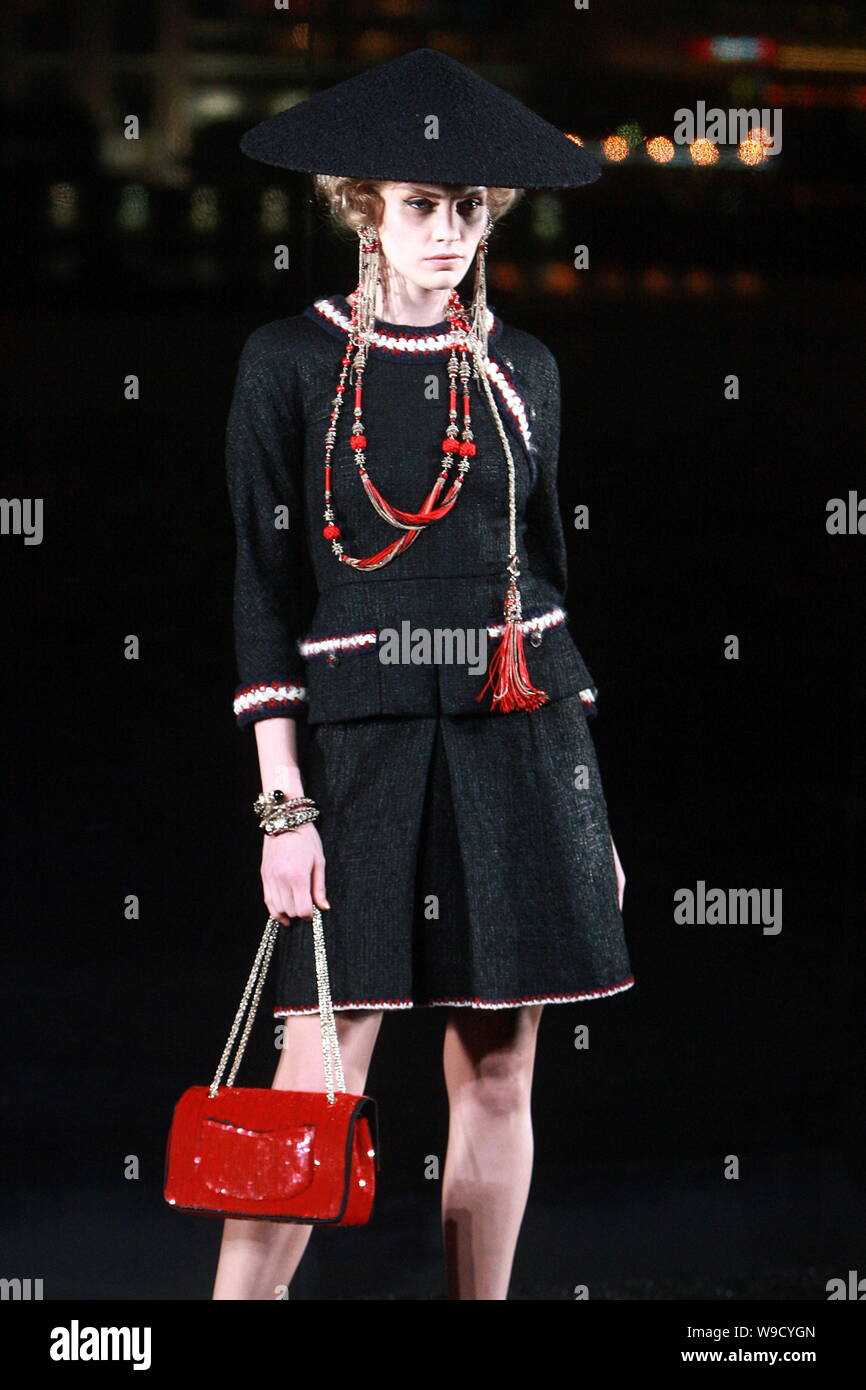 A model parades to display the new collection by fashion designer Karl ...