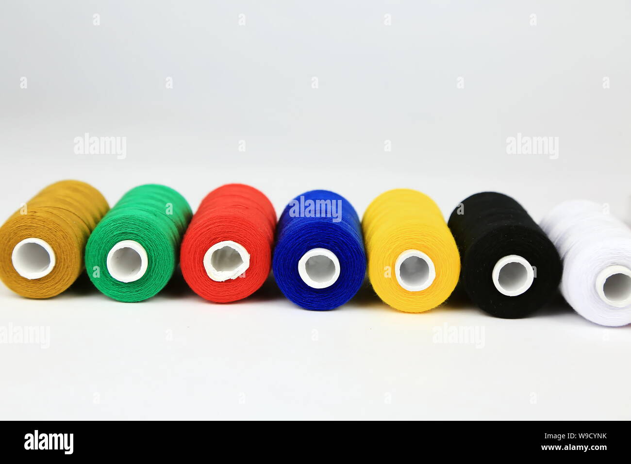 Yarn in different colors isolated against white background Stock Photo ...