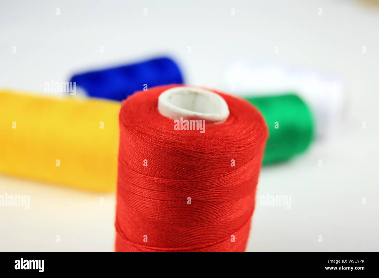 Yarn in different colors isolated against white background Stock Photo ...