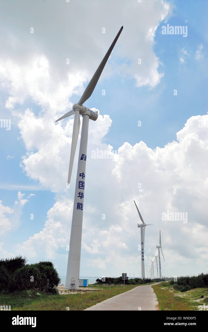 --FILE-- Wind turbines are seen at a wind farm of Huaneng Group in ...