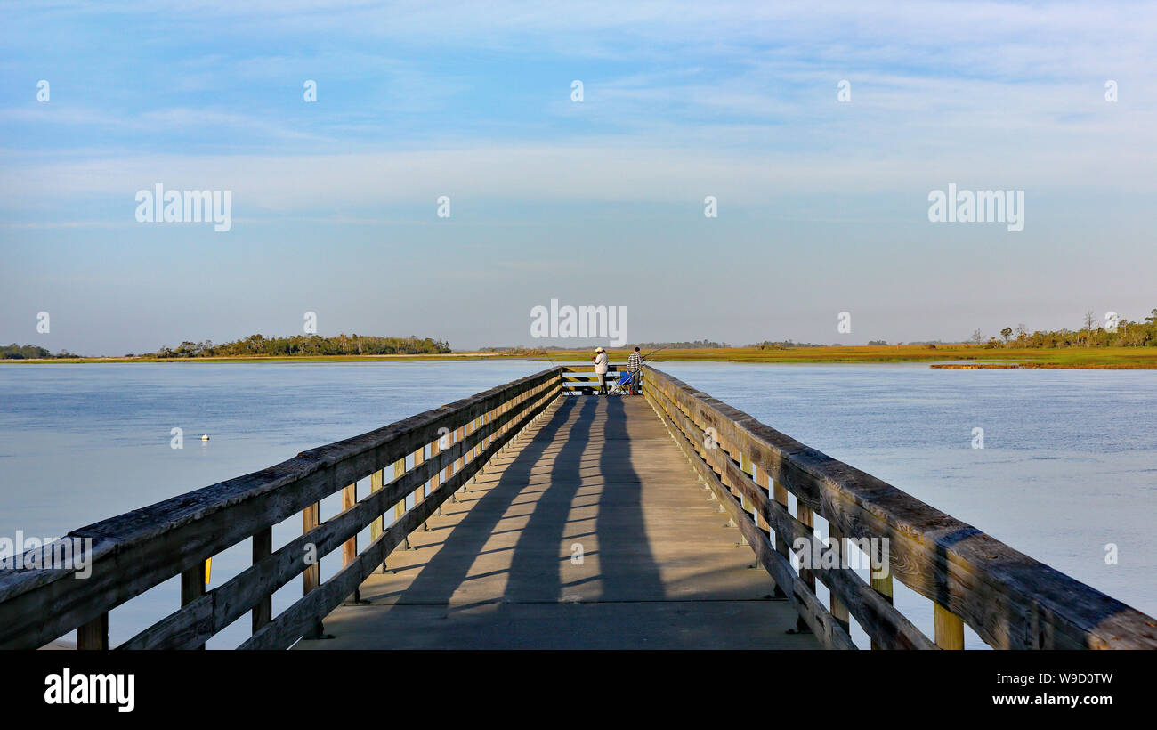 Early morning at the south end of Tybee Island beach. A view of the ...