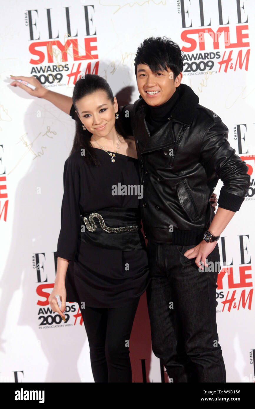 Chinese actress Dong Jie and her actor husband Pan Yueming are seen at ...