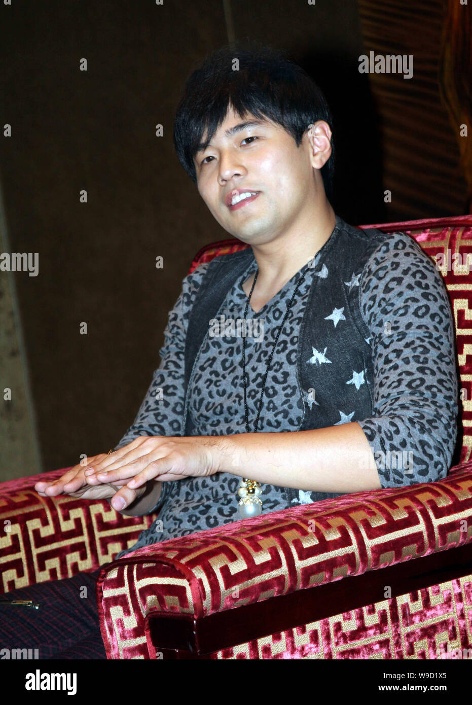 Taiwanese singer and actor Jay Chou is seen at a press conference to ...