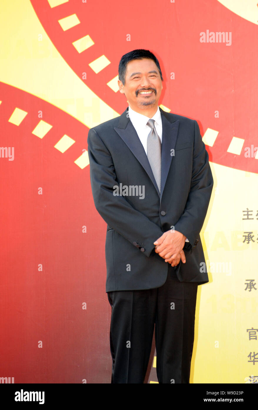 Hong Kong actor actor Chow Yun-fat poses on the red carpet prior to the ...