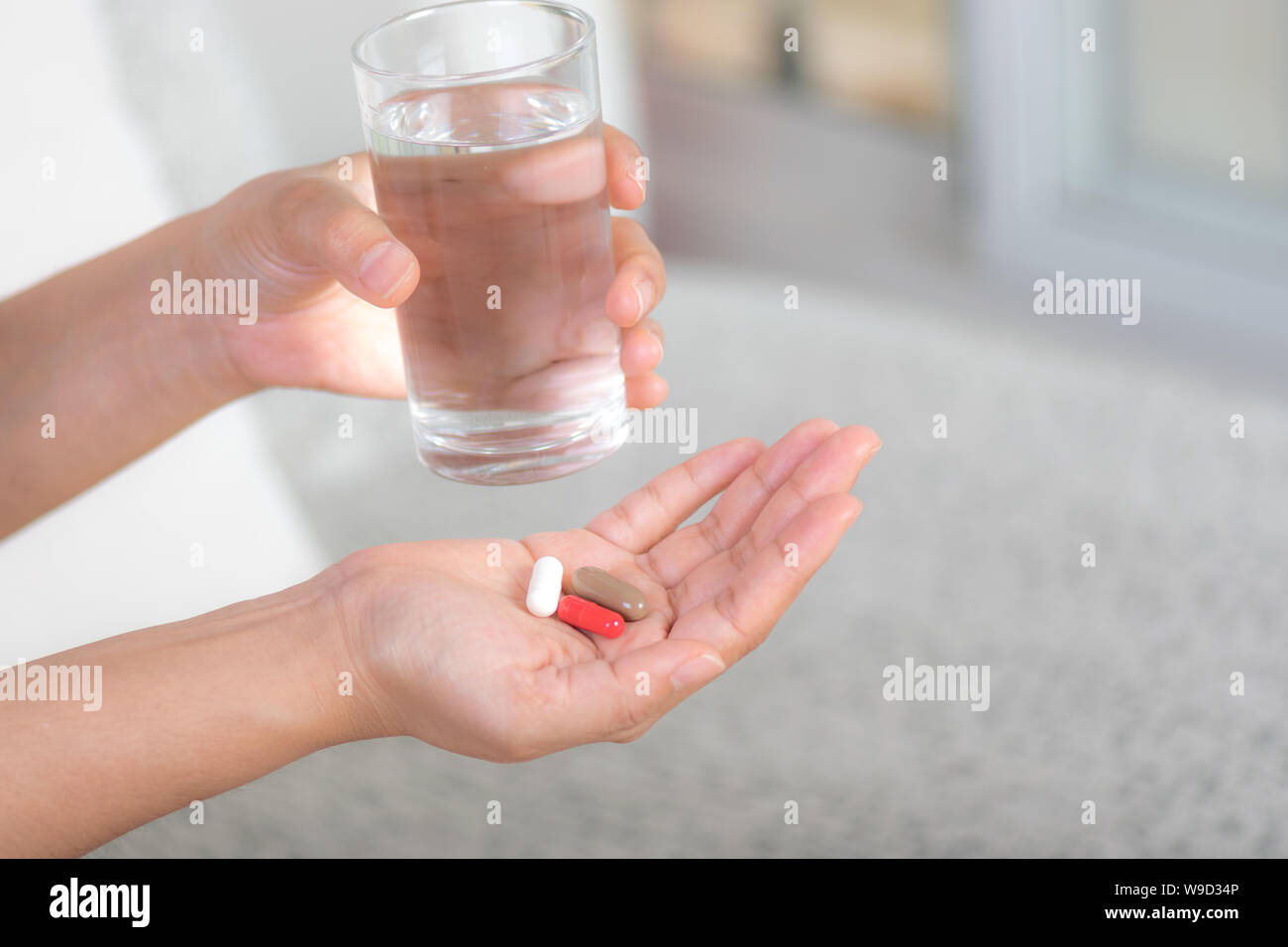 Close up of woman taking in pill, Medicine, health care and people ...