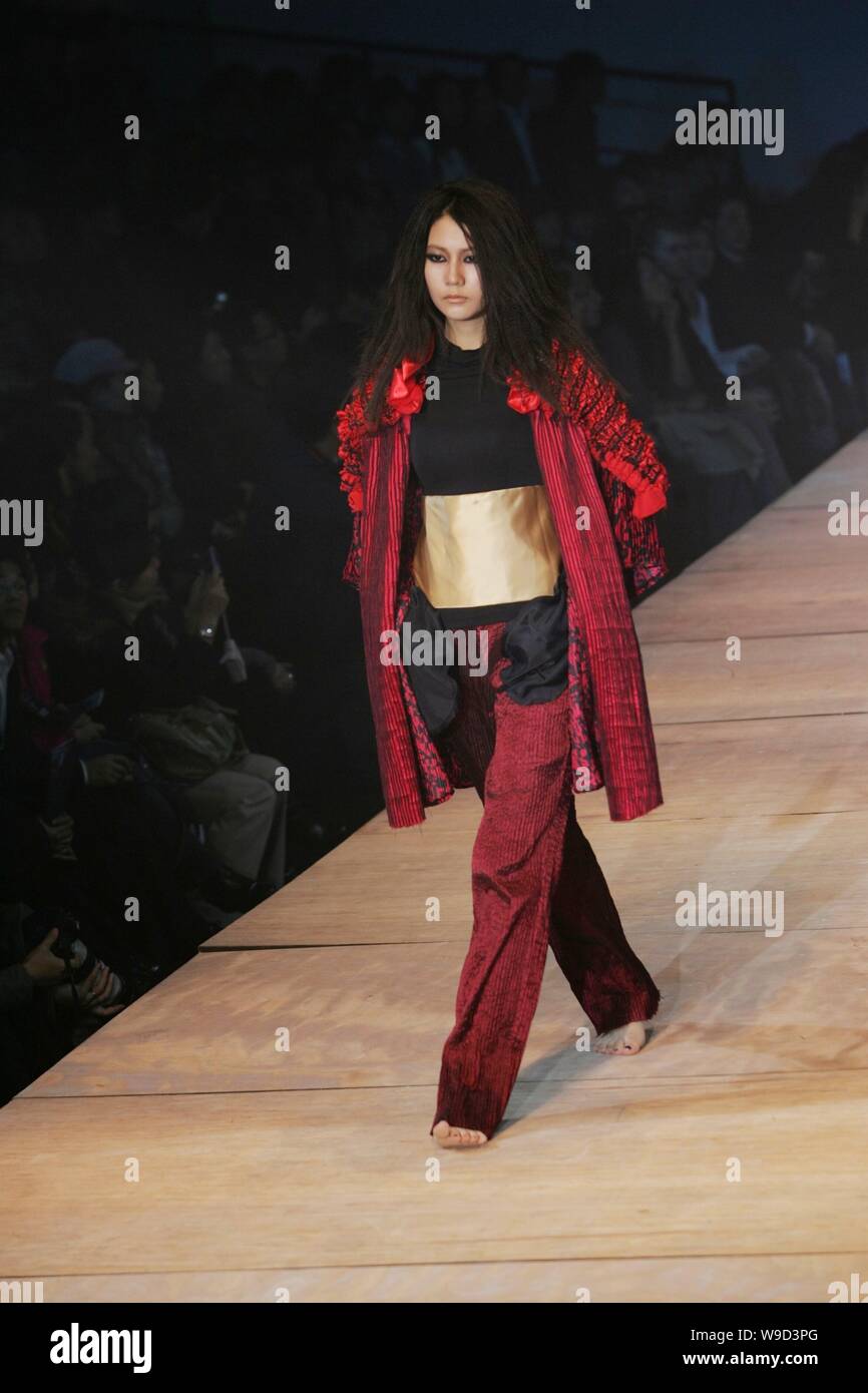 A model presents the new collection at the Mark Cheung 2010 Spring ...
