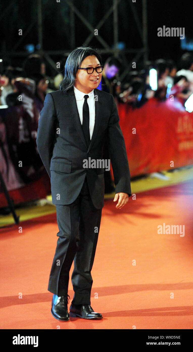 Hong Kong film director Peter Chan arrives for the premiere of the ...