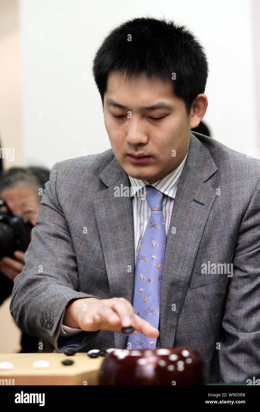 Chinas Chang Hao competes against Japans Takao Shinji (unseen) at the ...