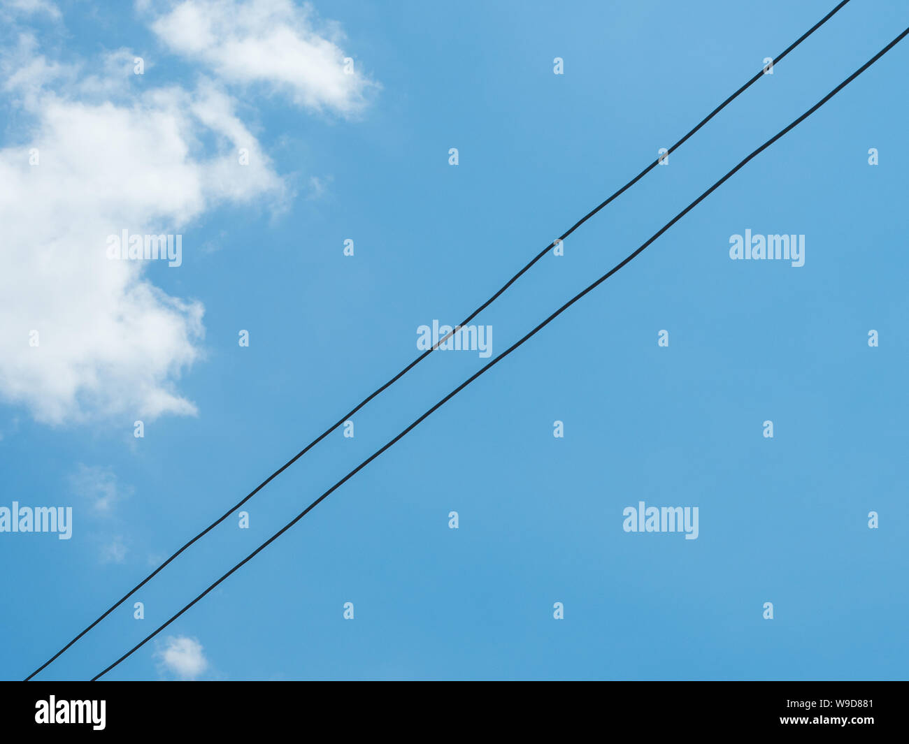 the electric cables with blue sky Stock Photo - Alamy