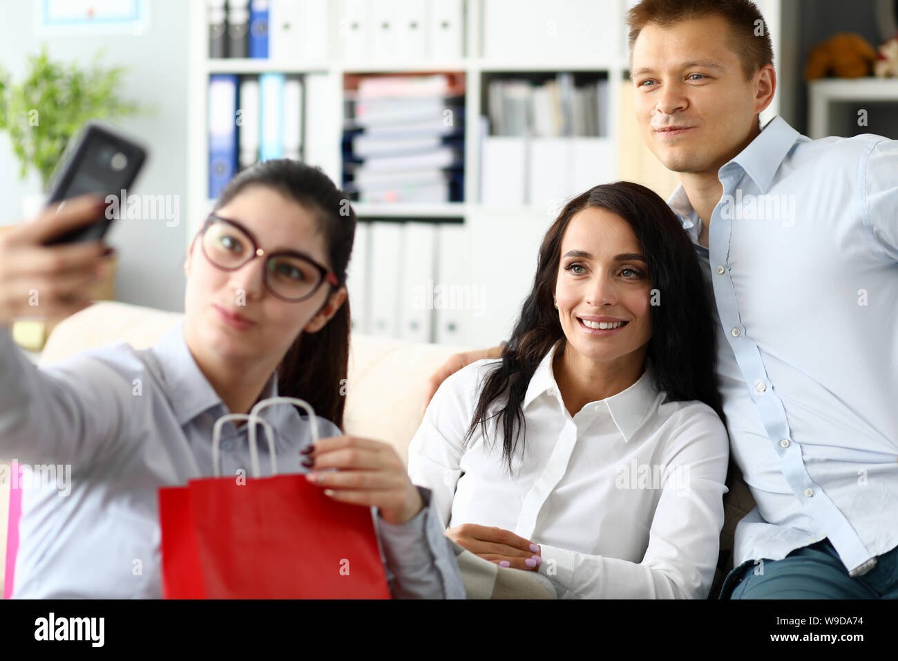 Group of millennial friends takes selfie while Stock Photo - Alamy