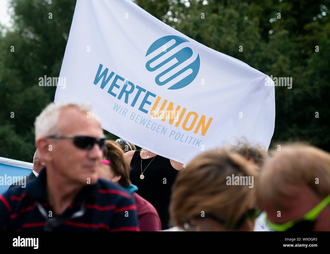 Potsdam, Germany. 13th Aug, 2019. A supporter of the values union, a ...
