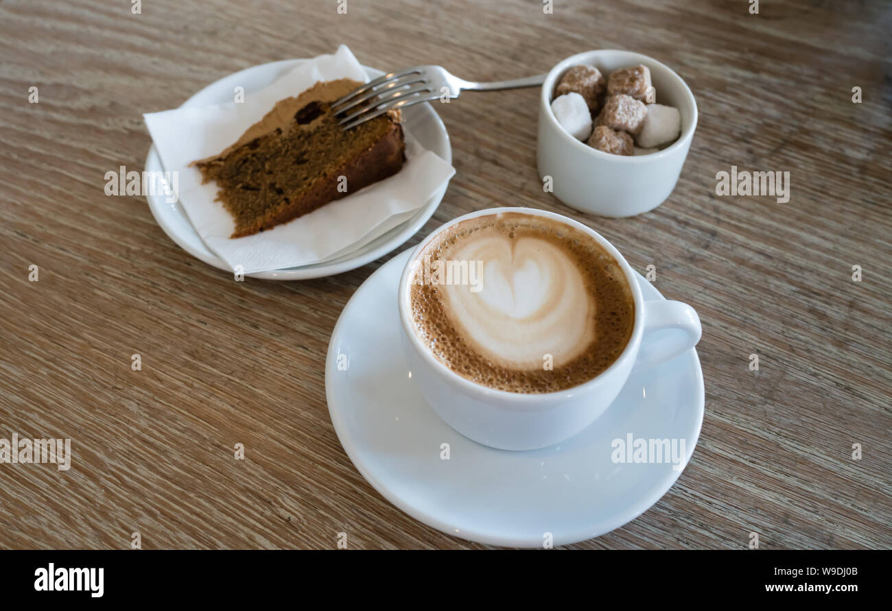 Cappuccino and cake at Rick Stein's Sandbanks Restaurant Stock Photo ...