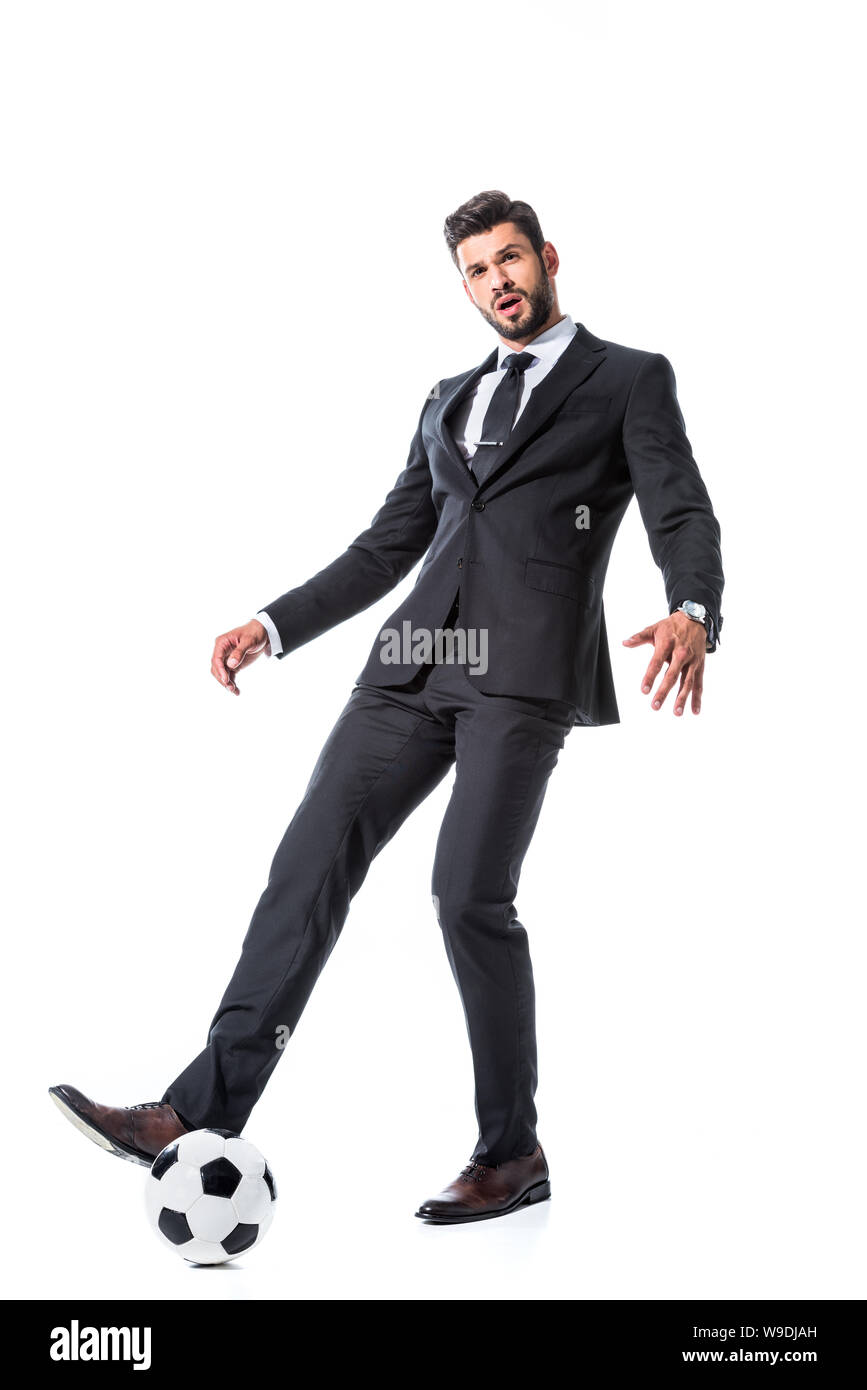 handsome businessman in formal wear posing with soccer ball Isolated On ...