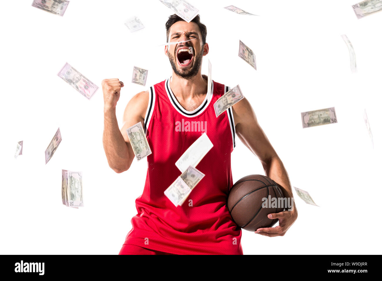 yelling basketball player Isolated On White with falling money Stock ...