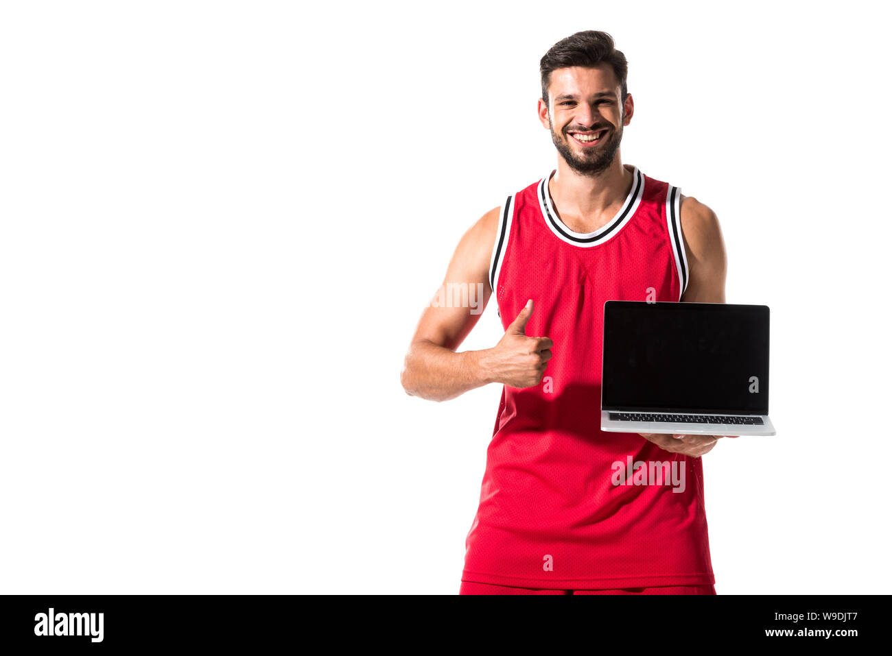 basketball player showing thumb up and holding laptop Isolated On White ...