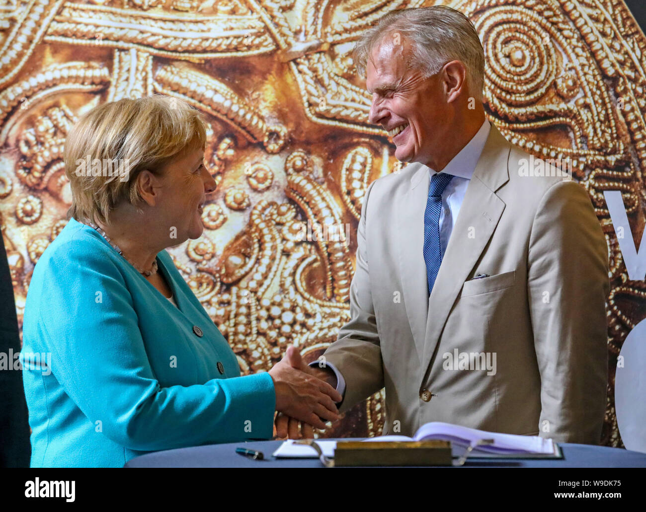 Stralsund, Germany. 13th Aug, 2019. After visiting the exhibition at ...