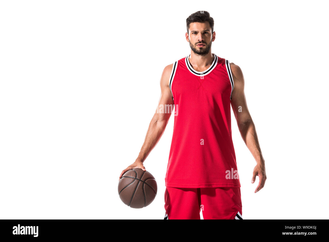 handsome athletic basketball player in red uniform with ball Isolated ...