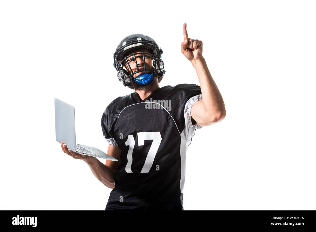 American Football player with laptop pointing with finger Isolated On ...