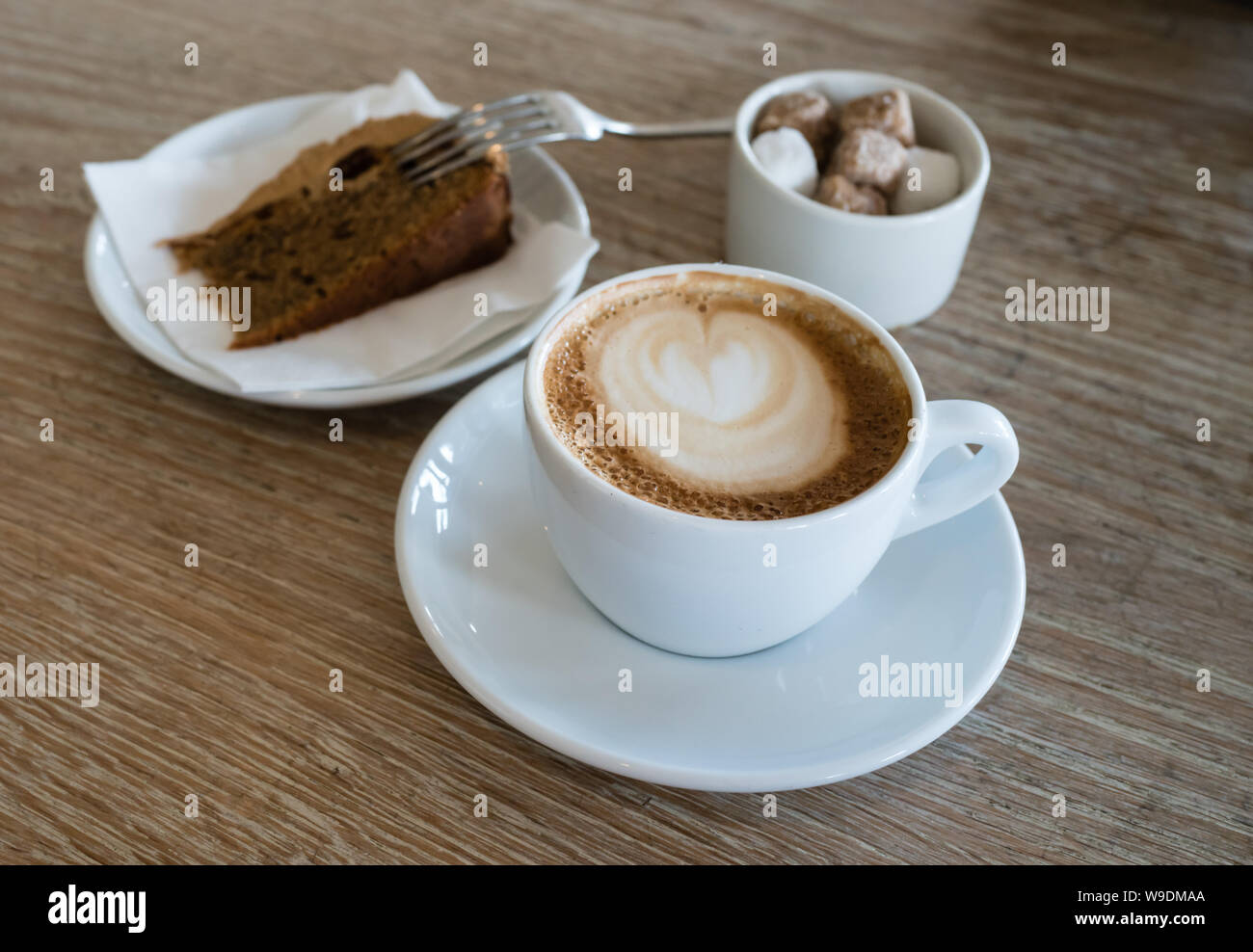 Cappuccino and cake at Rick Stein's Sandbanks Restaurant Stock Photo ...