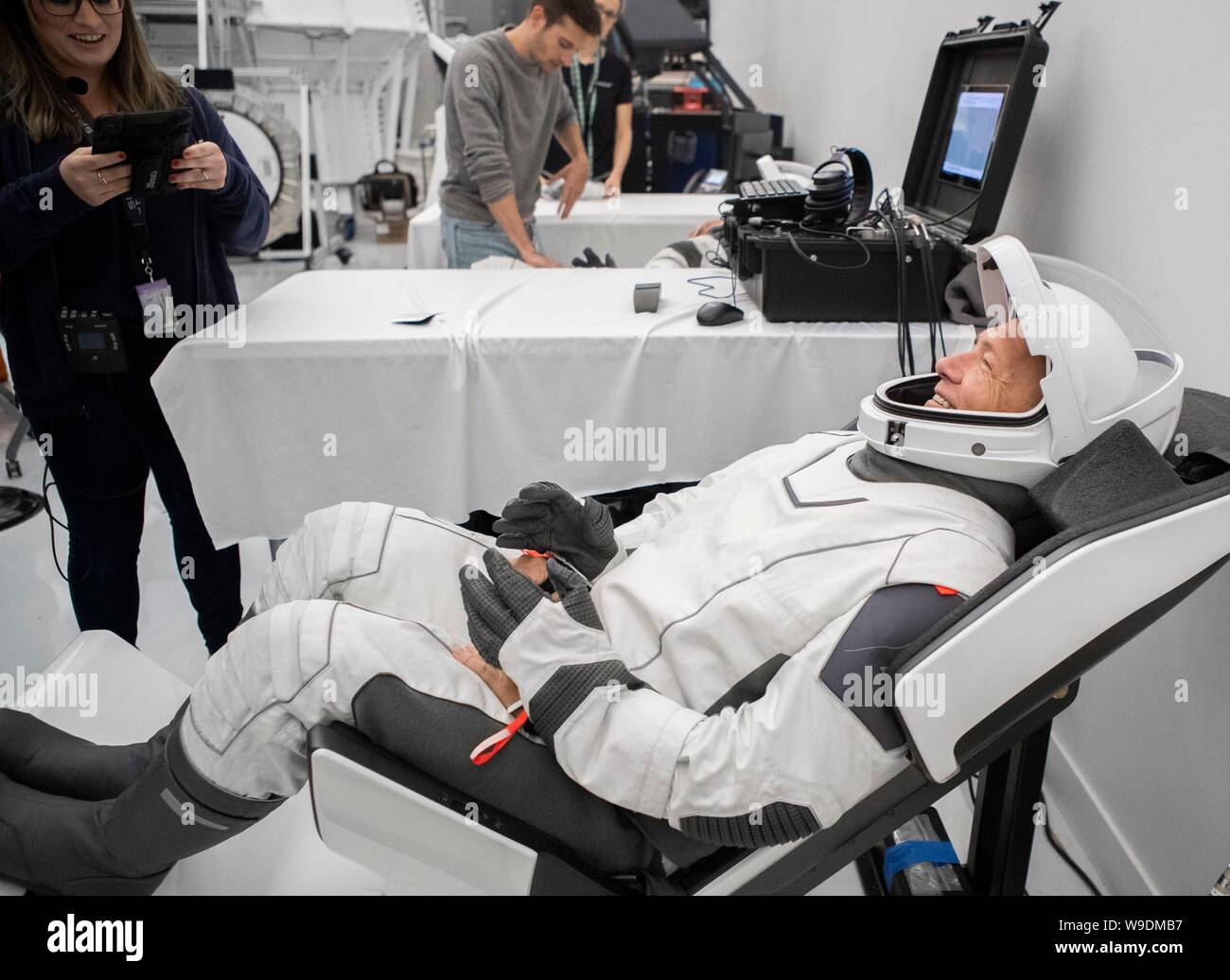 NASA astronaut Doug Hurley wears the SpaceX launch suits during a suit ...
