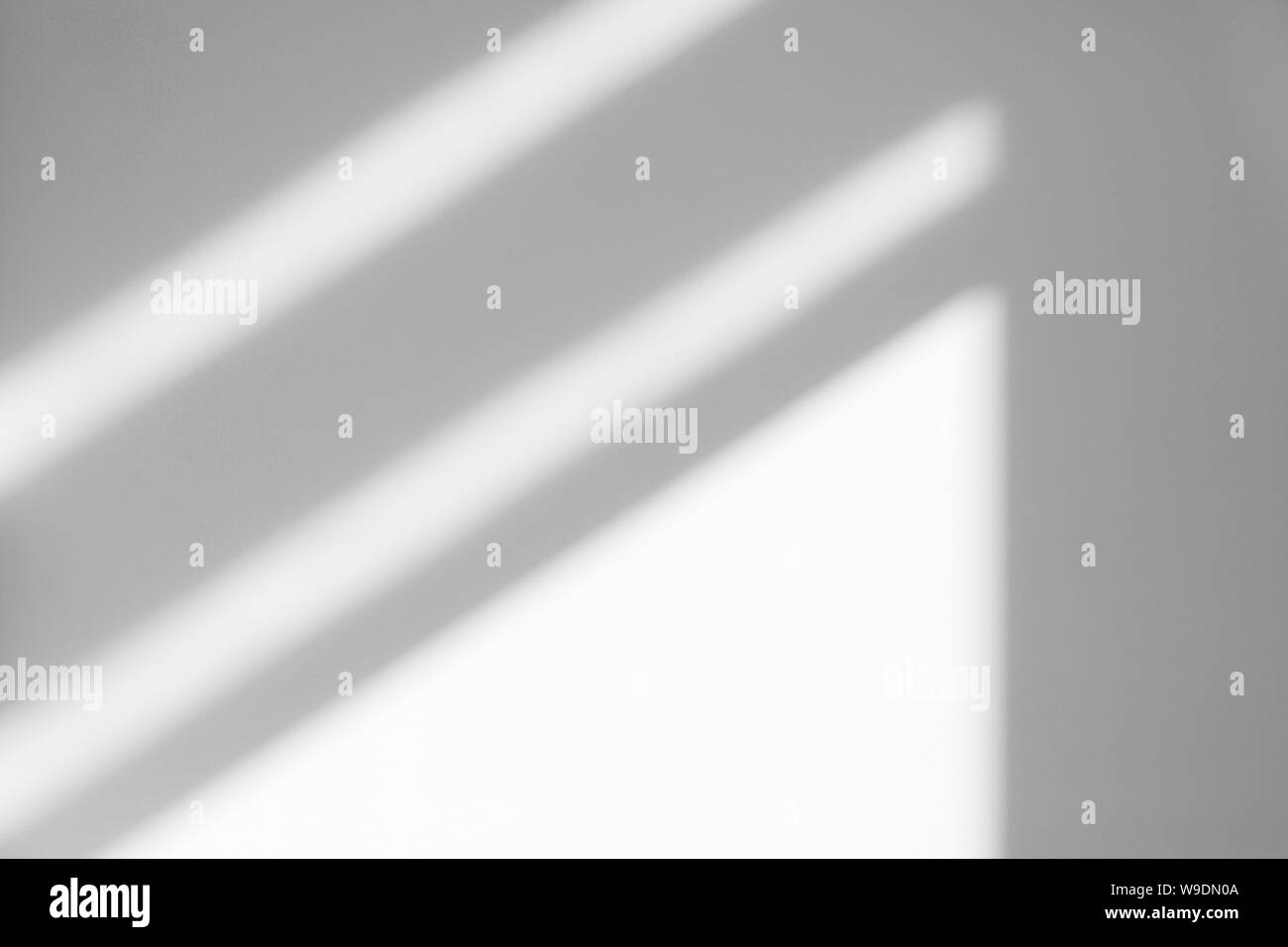 Organic drop shadow on a white wall, overlay effect for photo, mock-ups ...