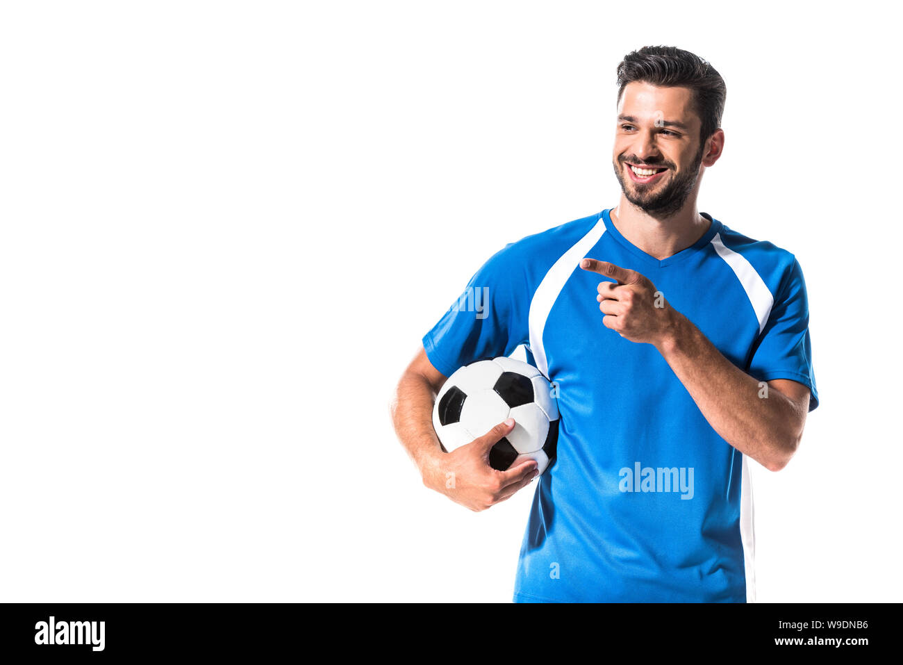 happy soccer player with ball pointing with finger Isolated On White ...