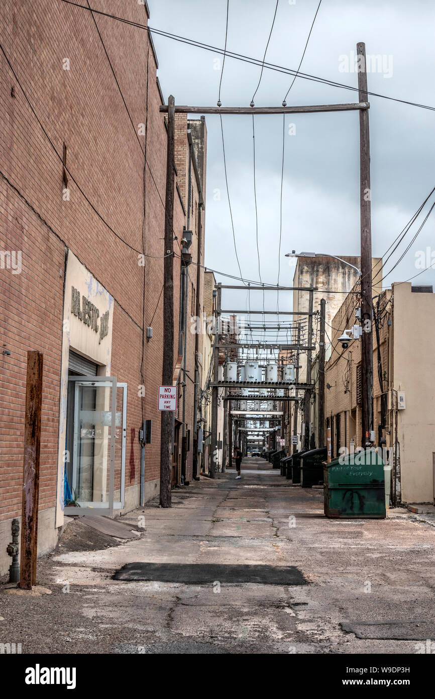 Looking down an alleyway with wires and cables, Texas, USA Stock Photo ...