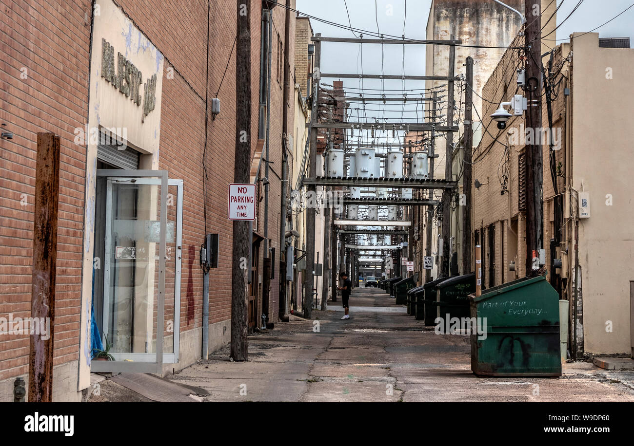 Looking down an alleyway with wires and cables, Texas, USA Stock Photo ...