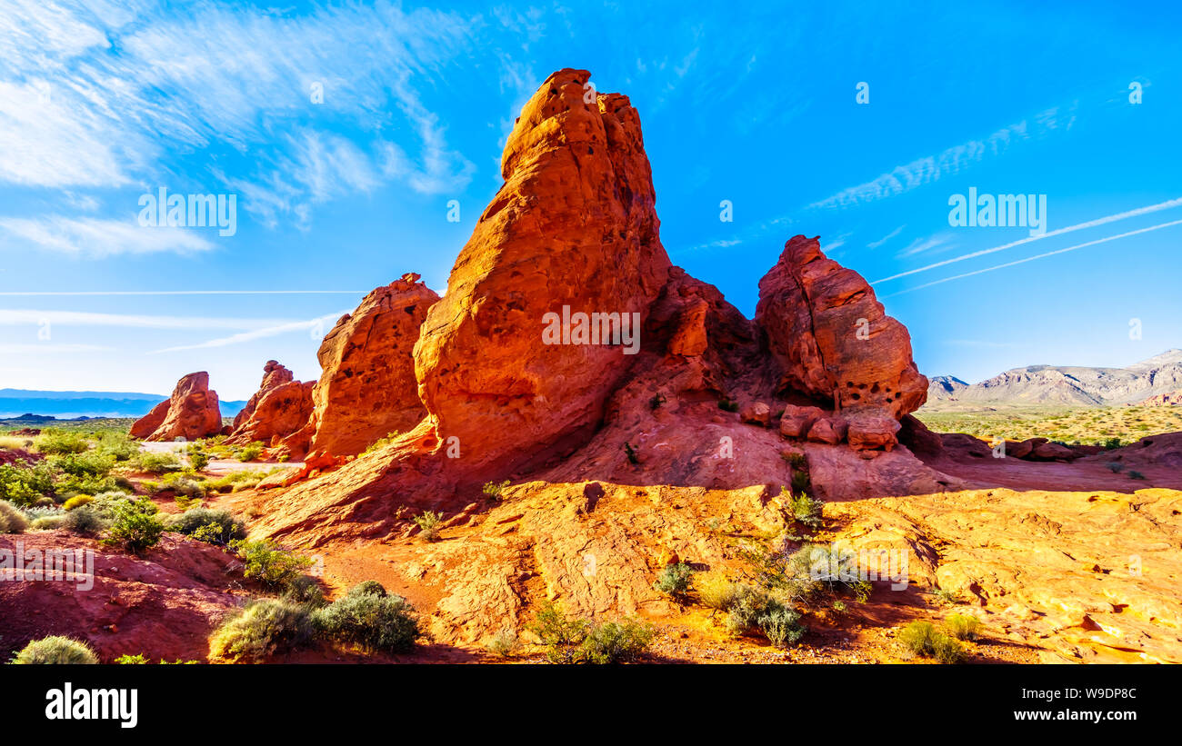 Sunrise over the bright red Aztec sandstone rock formation of the Seven ...