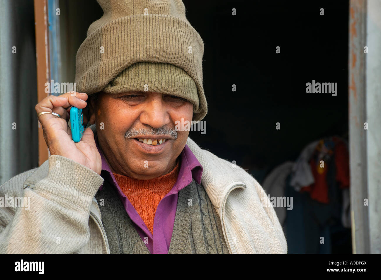 Rural village indian man using mobile phone hi-res stock photography ...