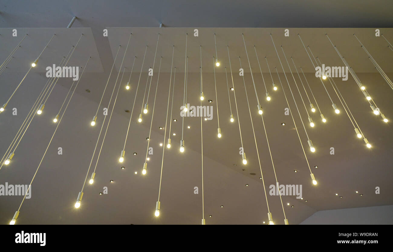 Hanging lights on ceiling. Interior concept for modern buildings Stock ...