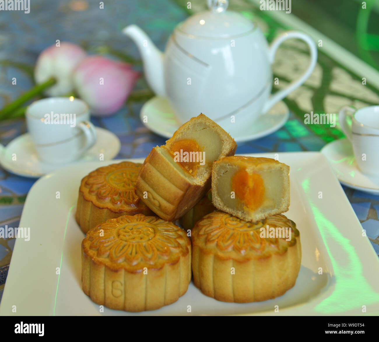 Tasty moon cake for Mid-Autumn festival with tea pot Stock Photo - Alamy