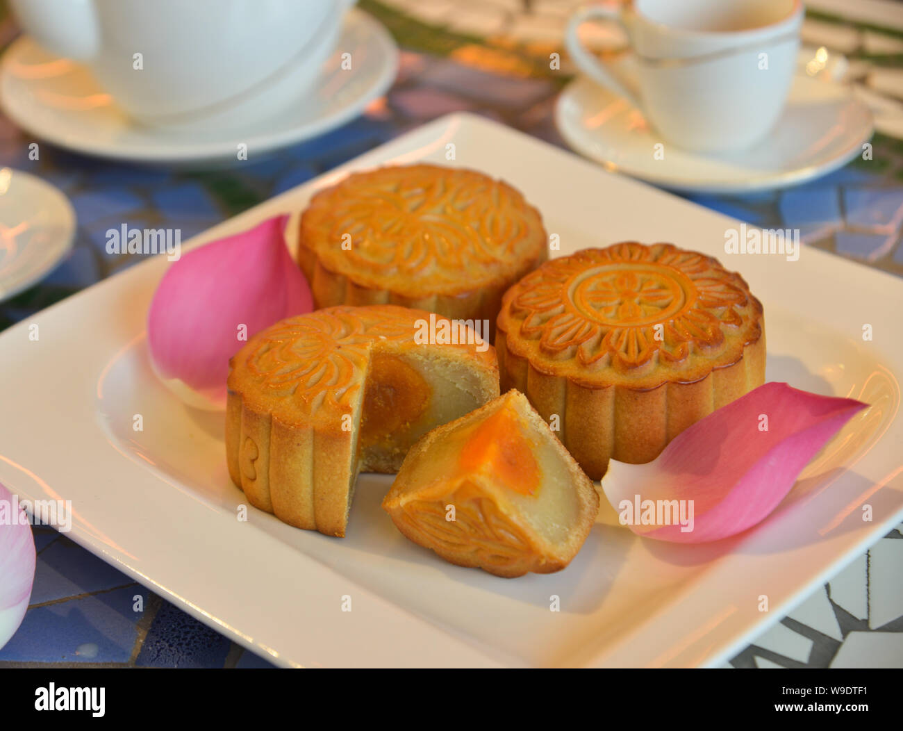 Tasty moon cake for Mid-Autumn festival with tea pot Stock Photo - Alamy